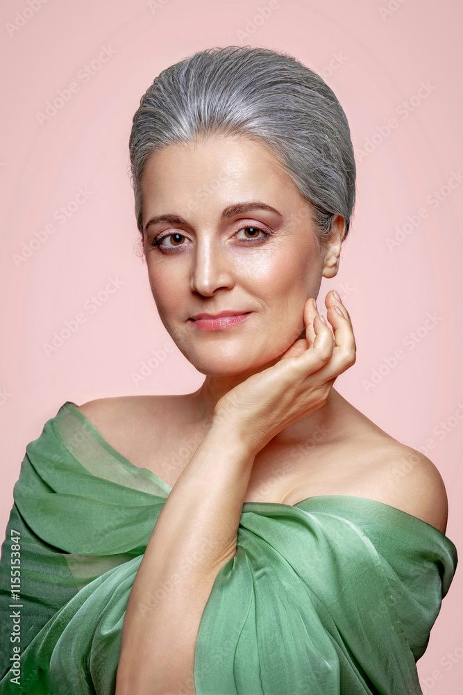 Portrait of a beautiful woman with gray hair and well-groomed smooth ...