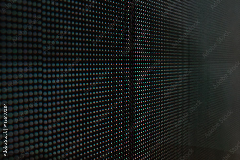 Close-up photo of video wall screen on black background with pixel grid ...