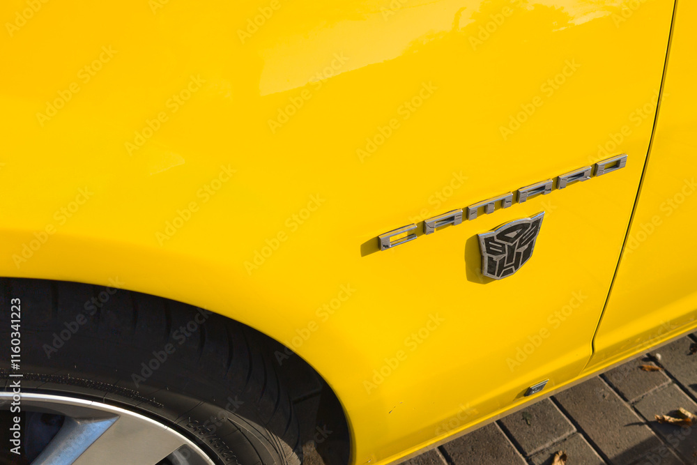 Chevrolet camaro logo yellow and brand sign front of sport american ...