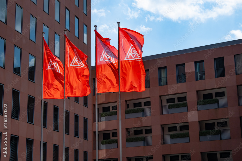 Red IGM flags IG Metall logo, German dominant metalworkers union on ...