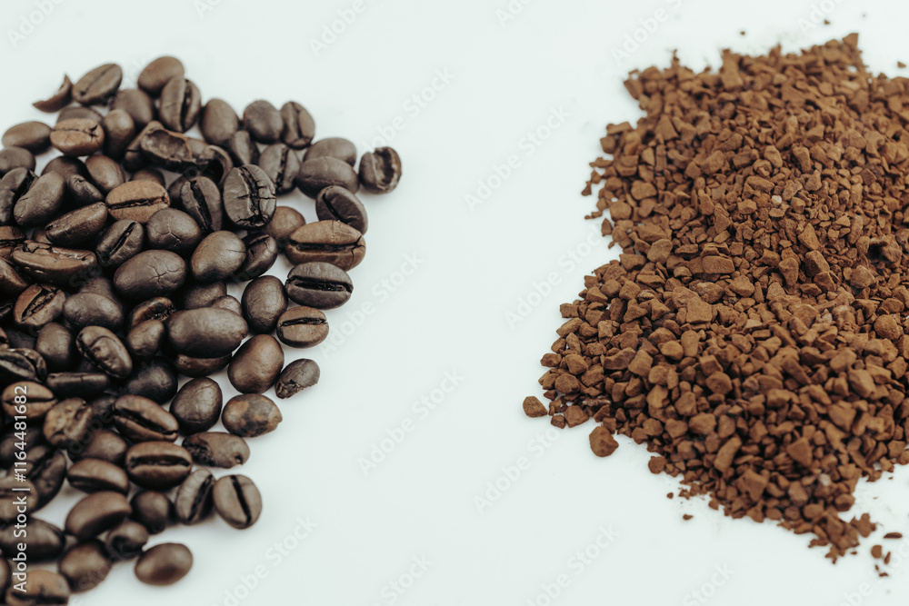 Whole coffee beans and instant coffee granules side-by-side. A ...