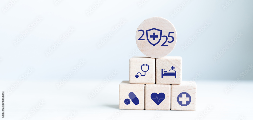Health insurance concept Wooden cube with text 2025 and medical icons ...