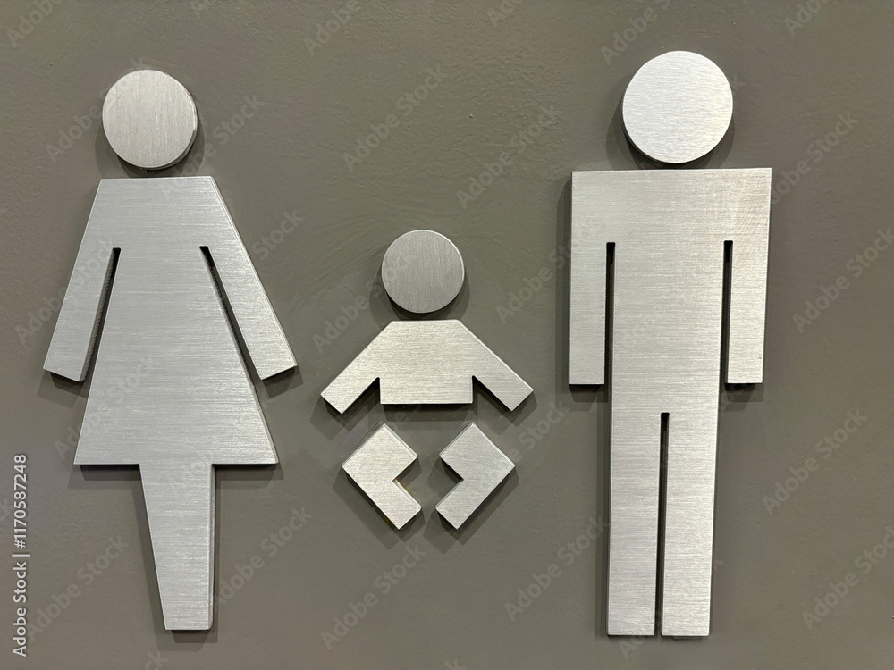 Modern metallic family restroom sign featuring woman, man, and child ...