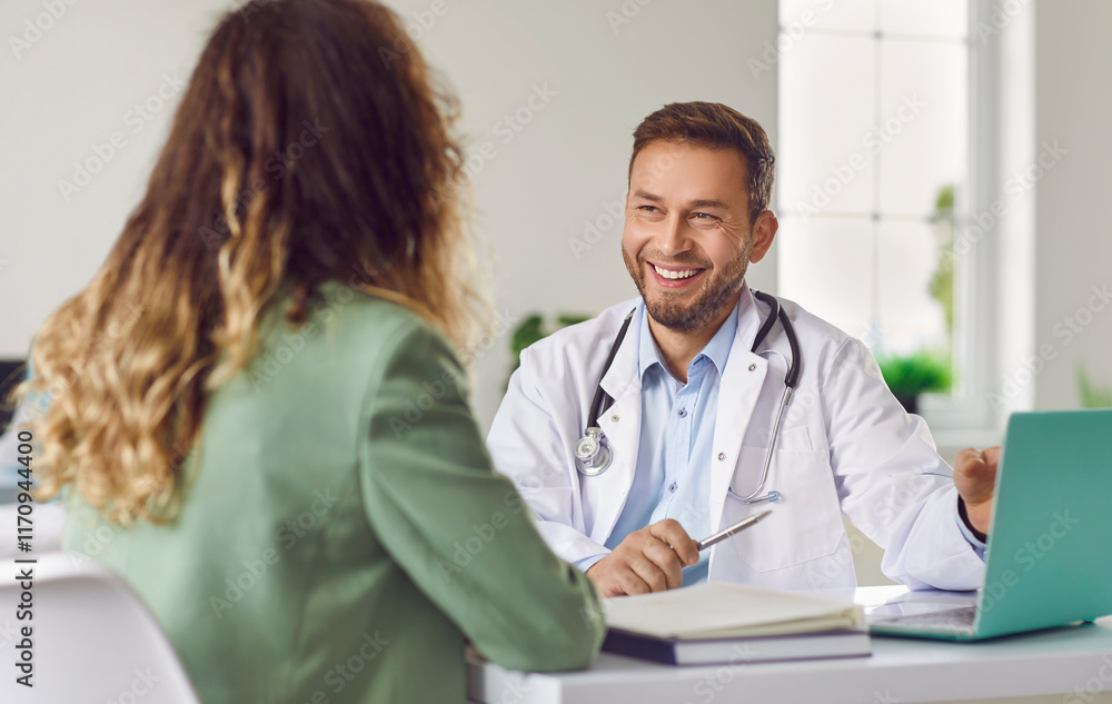 Conversation with doctor. Portrait of friendly male doctor happily ...