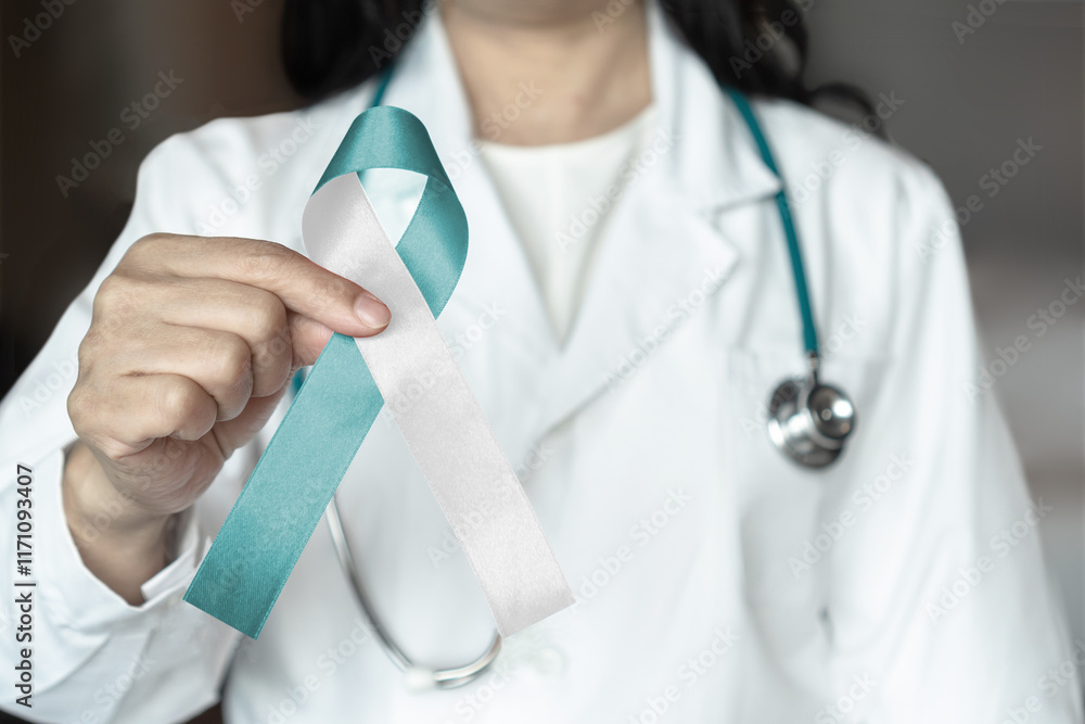 Teal and white ribbon for cervical cancer awareness month in January ...