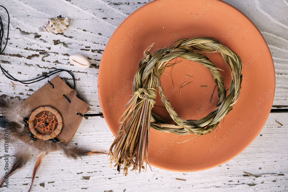 Sweetgrass braid (Hierochloe odorata), also called vanilla grass, on a ...