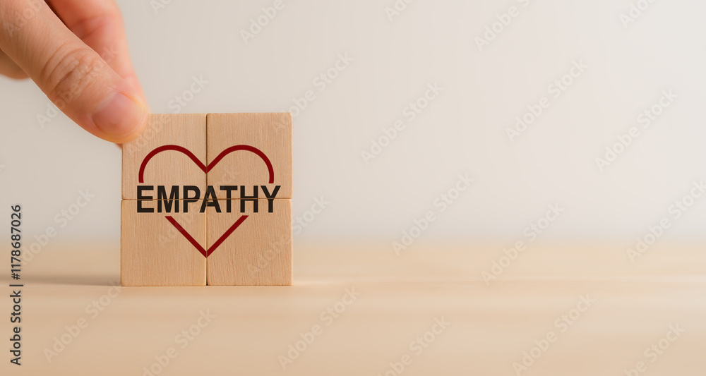 Empathy concept. Wooden blocks with empathy icons on minimal background ...