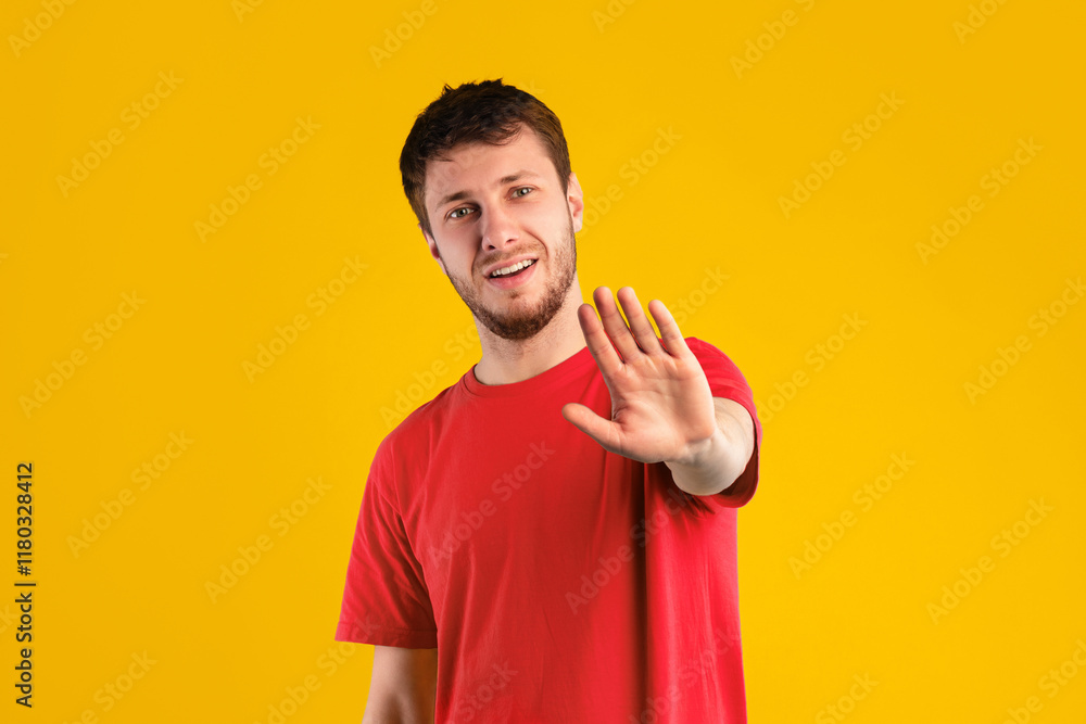 Keep Distance, Don't Stay Close To Me. Displeased young guy with ...