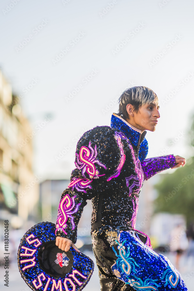 Dancer wearing sparkling costume performing during hispanic day parade ...