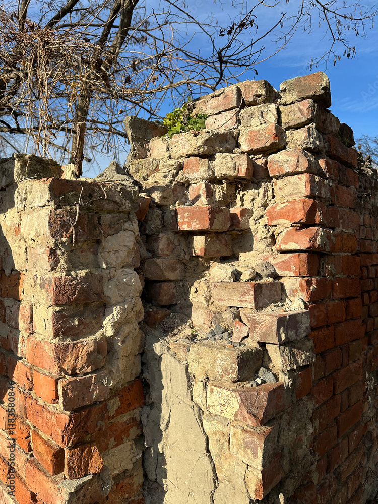 Broken ruined brick wall of a building Stock Photo | Adobe Stock