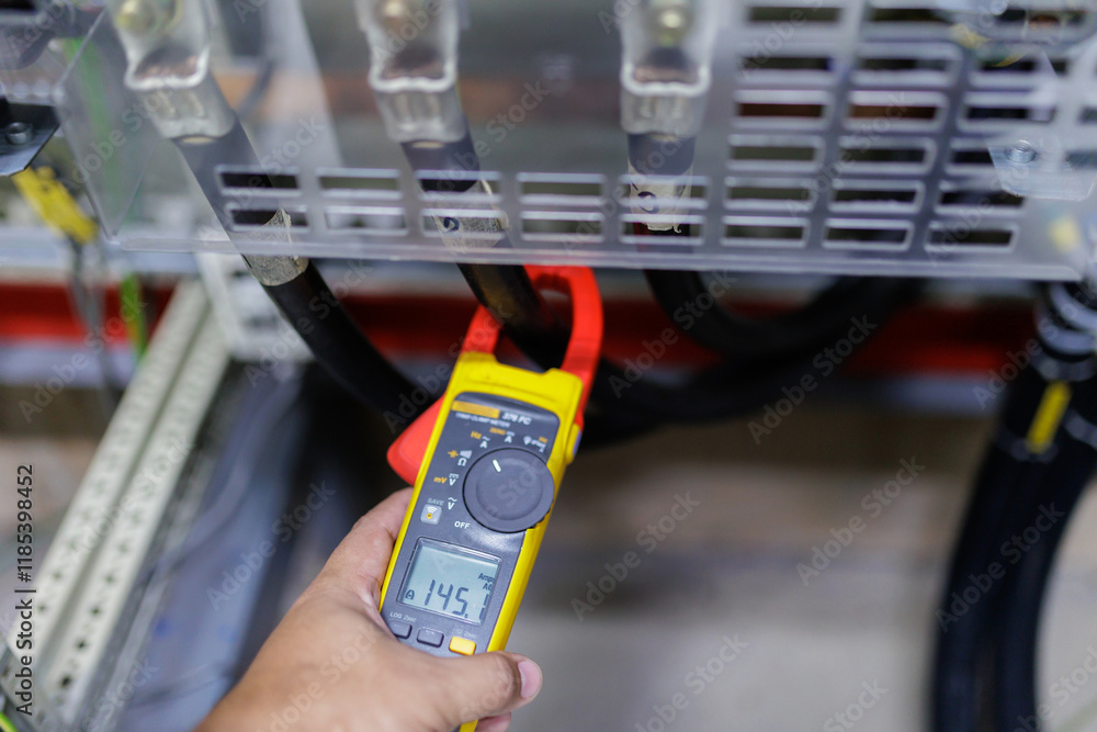Electrical engineering uses a multimeter to measure the electrical ...