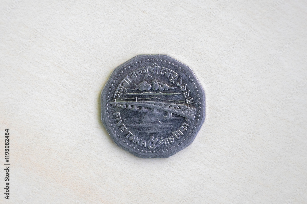 The five taka metal coin of Bangladeshi Taka features a view of the ...