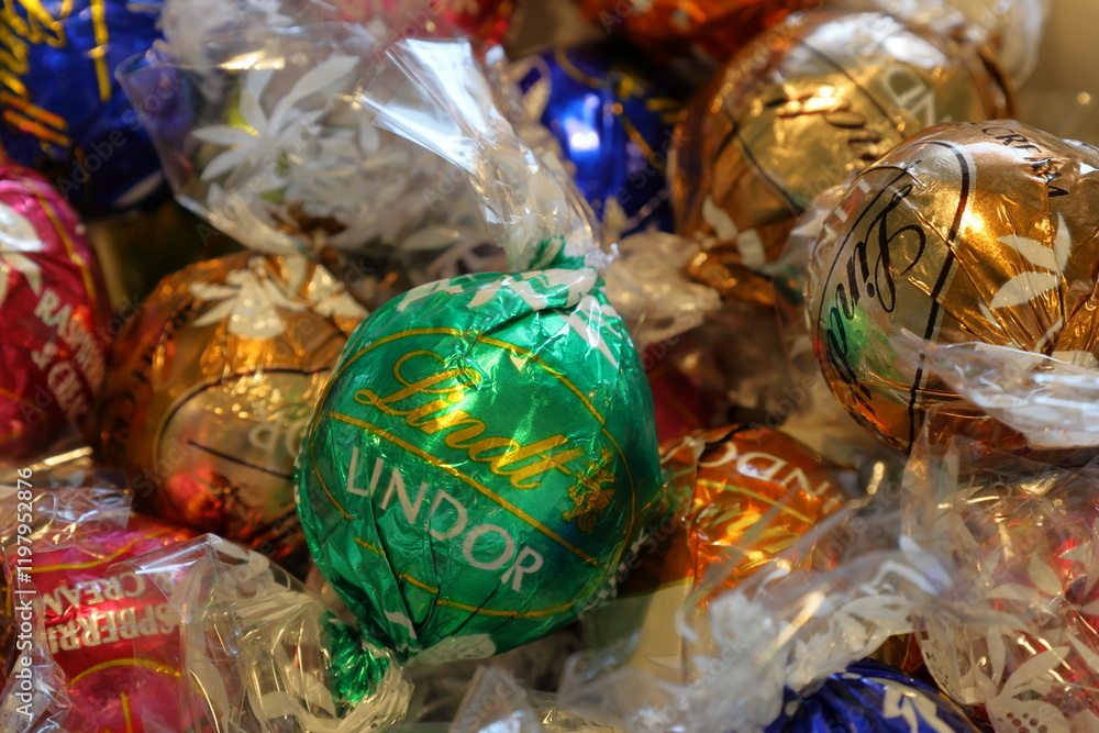Wrapped chocolates from Lindt. Lindor. Close up. Swiss chocolate. Stock ...