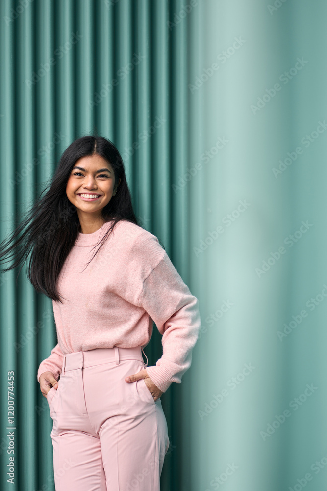 Happy generation z Asian teen girl wearing pink outfit having fun ...