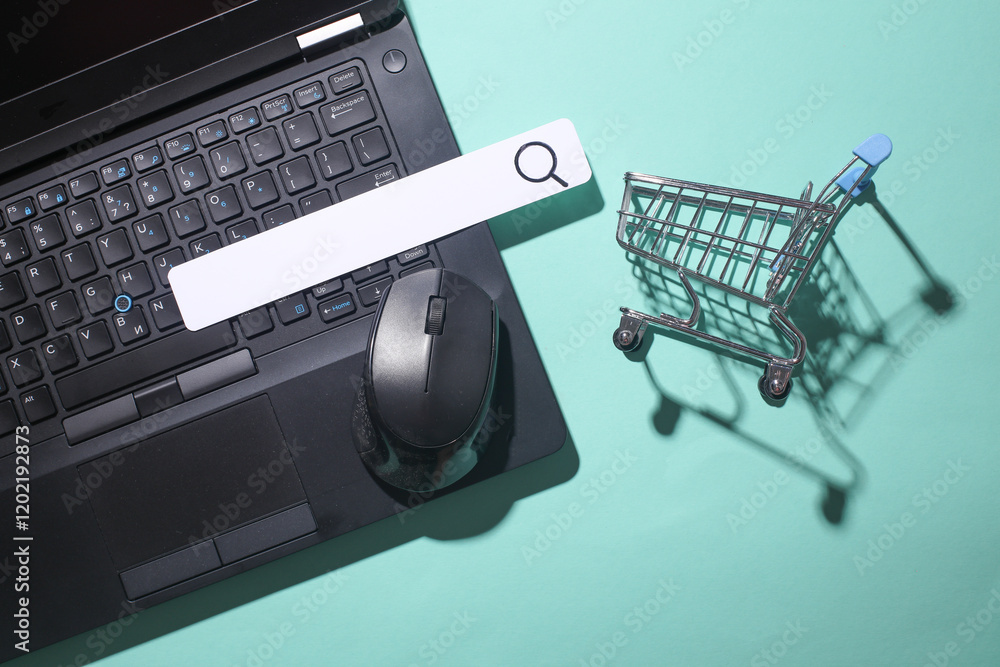 Paper search bar with cursor, laptop and shopping trolley on pink ...