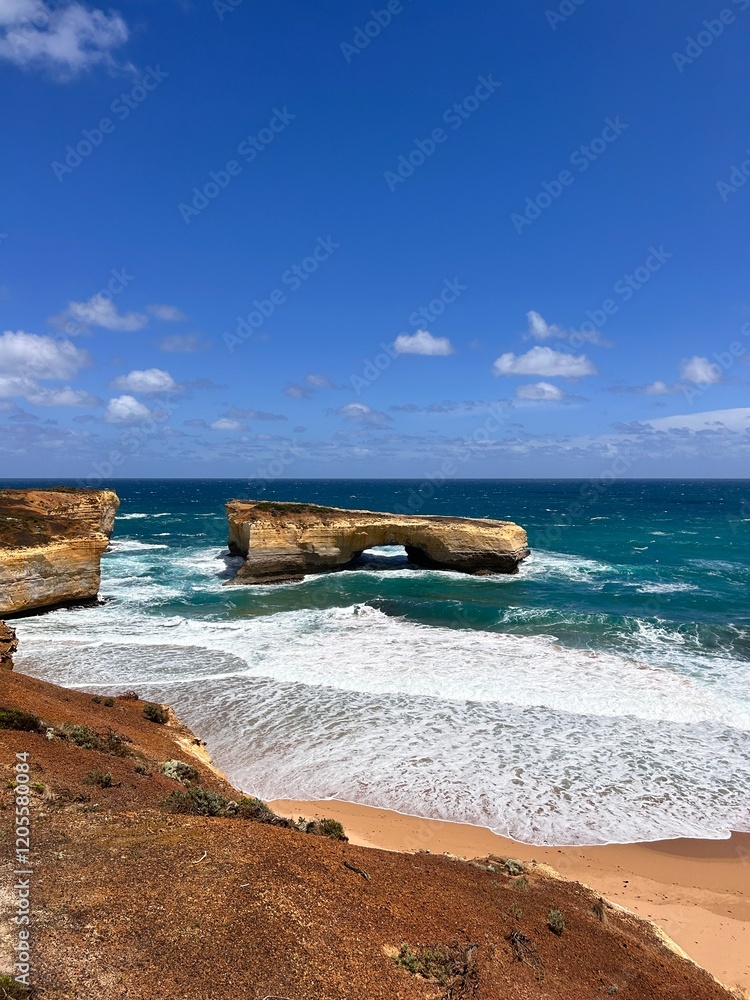 London Bridge, along the Great Ocean Road, is a natural rock formation ...