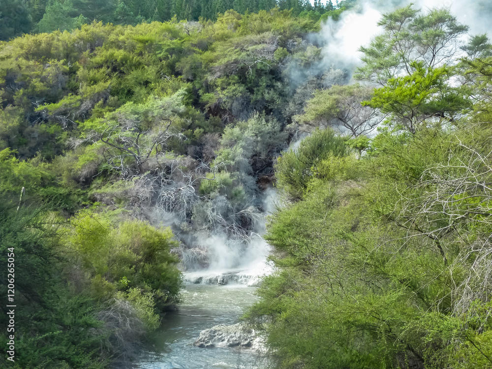 River and small waterfall in a geothermal area in Waiotapu Thermal ...