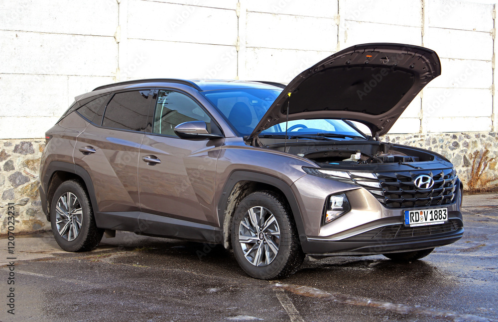 Vinnytsia, Ukraine; January 18, 2025. Brown Hyundai Tucson 2023 open hood. Hyundai Tucson TDI ...