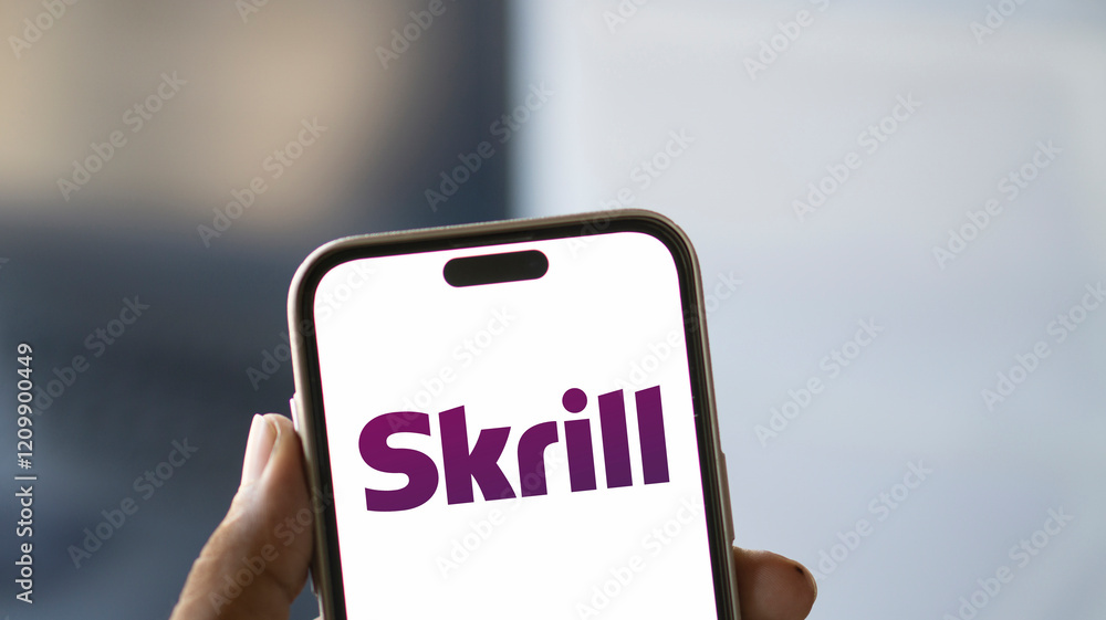 Dhaka, Bangladesh- 20 Jan 2025: skrill logo is displayed on smartphone ...