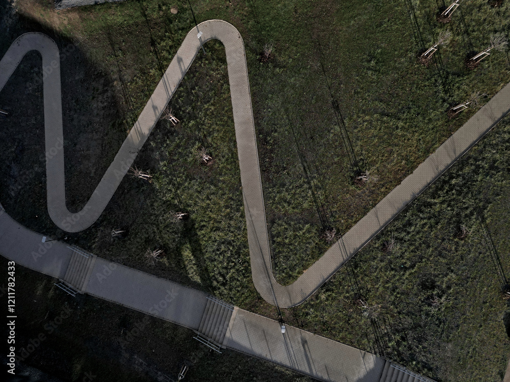 long staircase is an obstacle for wheelchair users and mothers with ...