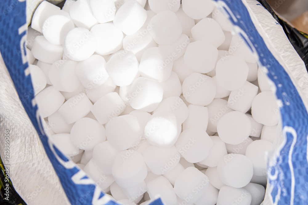 Tableted salt in package. Salt for automatic water softener. Salt water ...