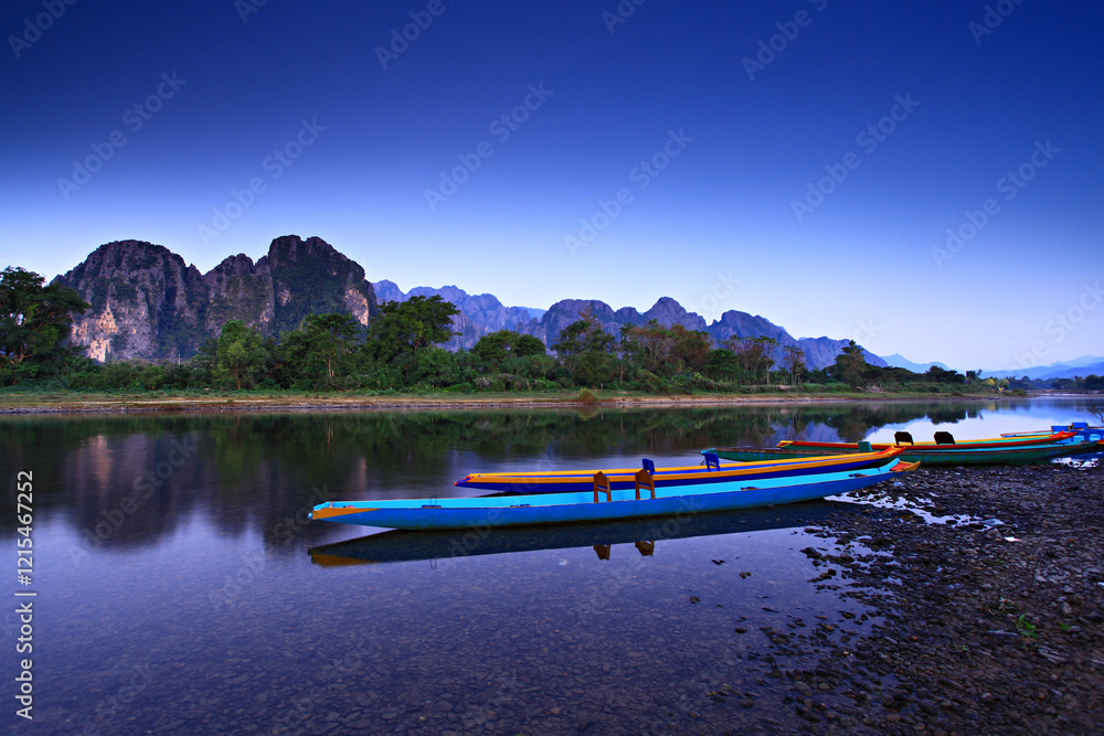Countryside long tail boats. Various colors lined up Waiting to welcome ...