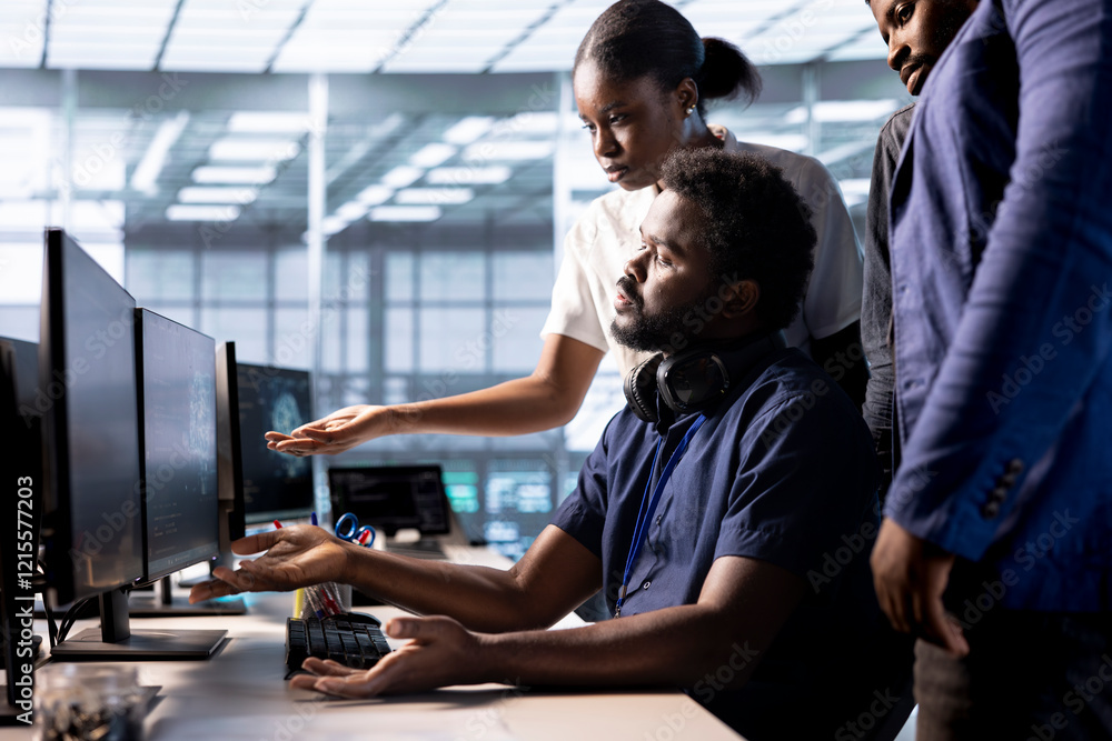 Team of data center programmers using programming languages to ... Team of data center programmers using programming languages to ...