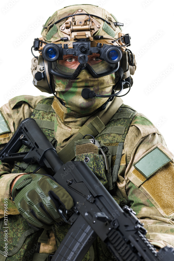 Tactical soldier wearing advanced gear and equipment in a focused pose ...