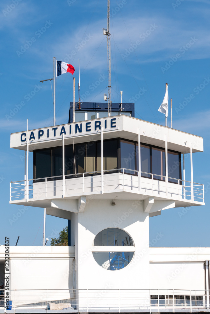 capitainerie text sign and french flag means harbor masters office ...