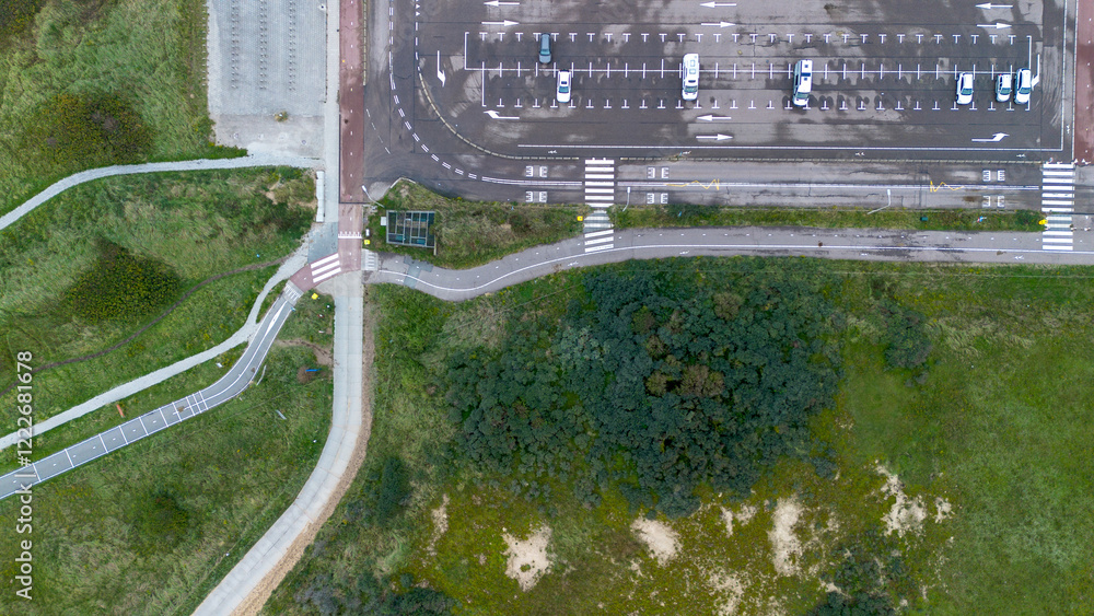 Stockfotot Aerial view of a parking lot with cars, crosswalks, paved ...
