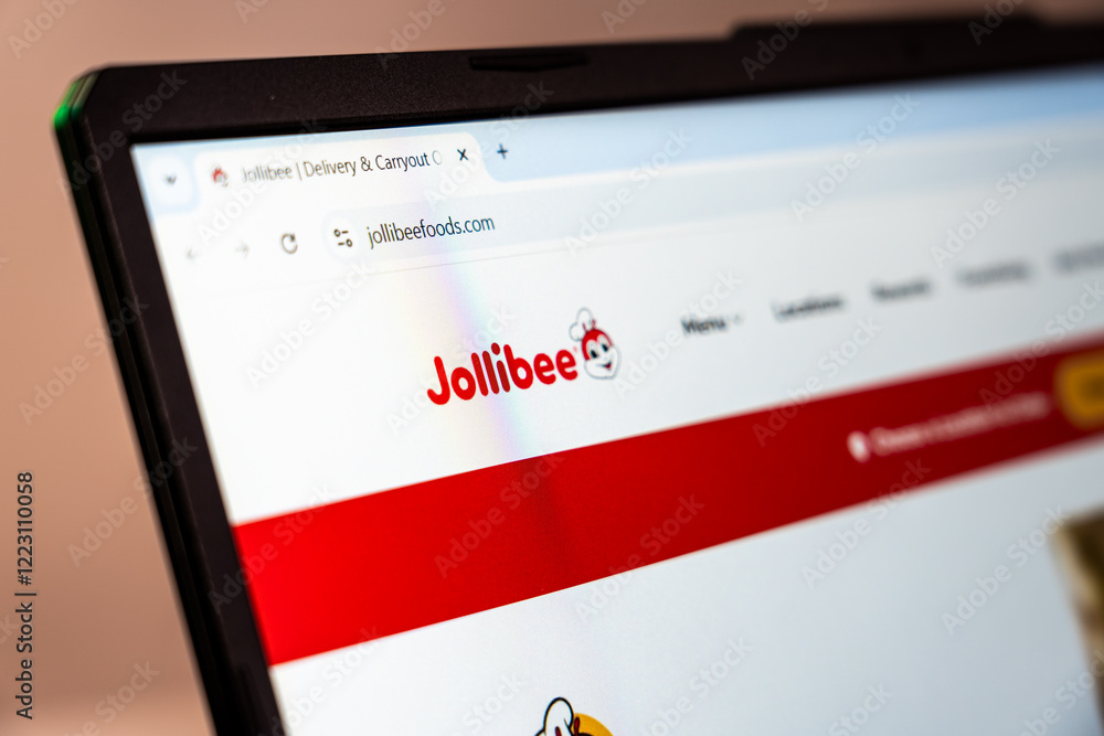 New York, USA - January 20, 2025: Jollibee website displayed on a screen for fast food delivery ...