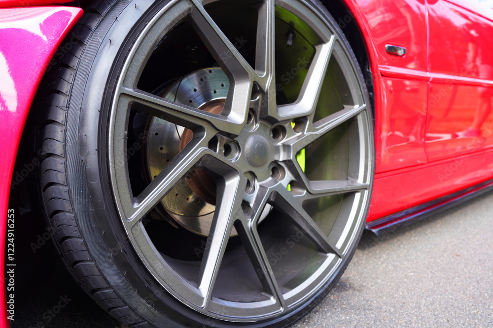Alloy wheel with calipers and racing brakes of the sport car. Racing ...