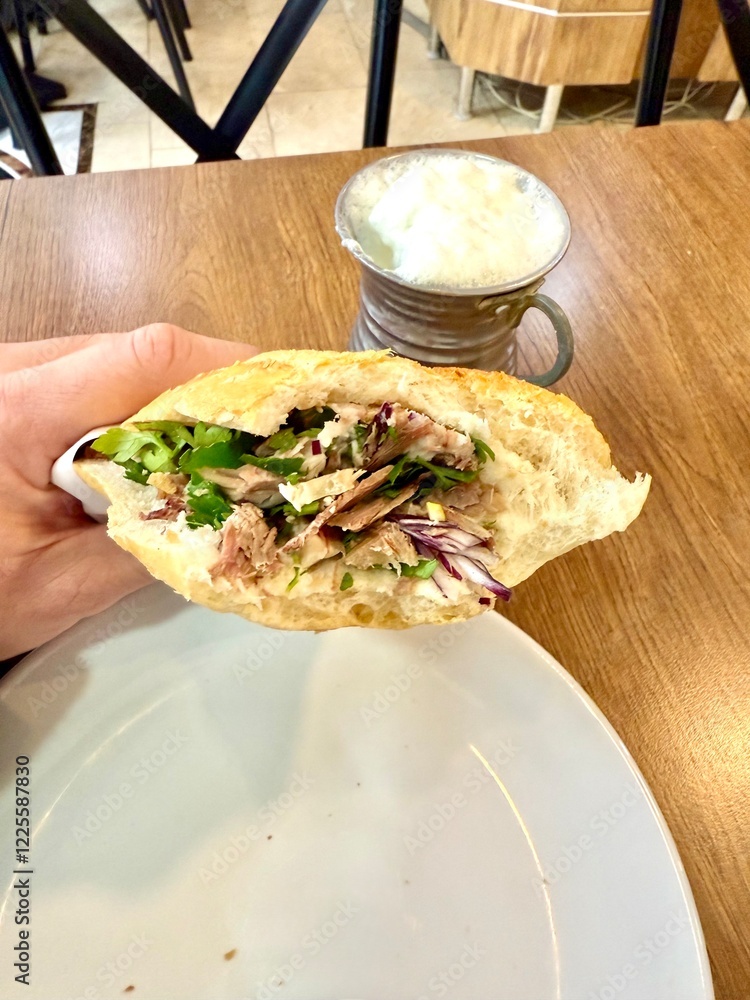 Offal sandwich Traditional Turkish cuisine food kelle sogus. Sogus made ...
