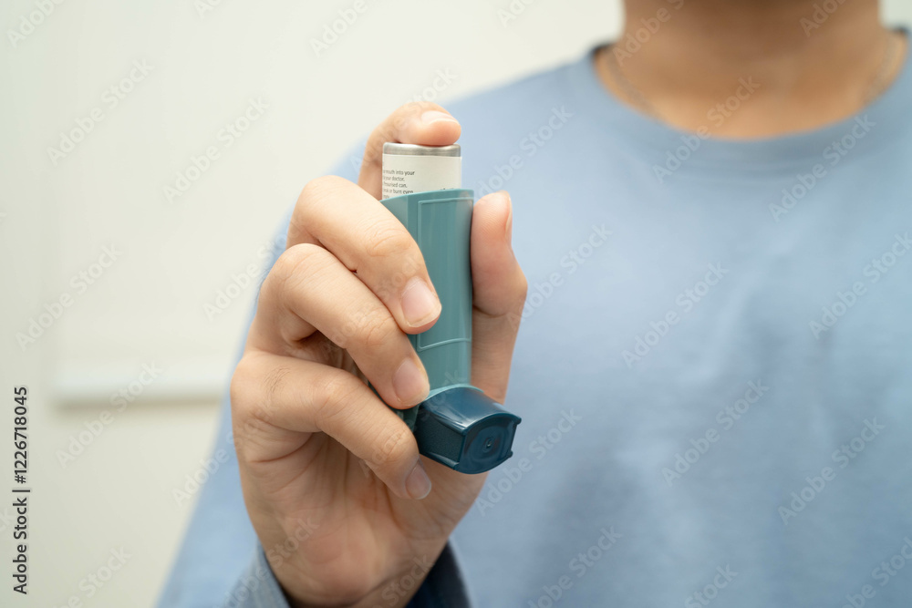 Asthma and chronic obstructive pulmonary disease COPD, Asian young man ...
