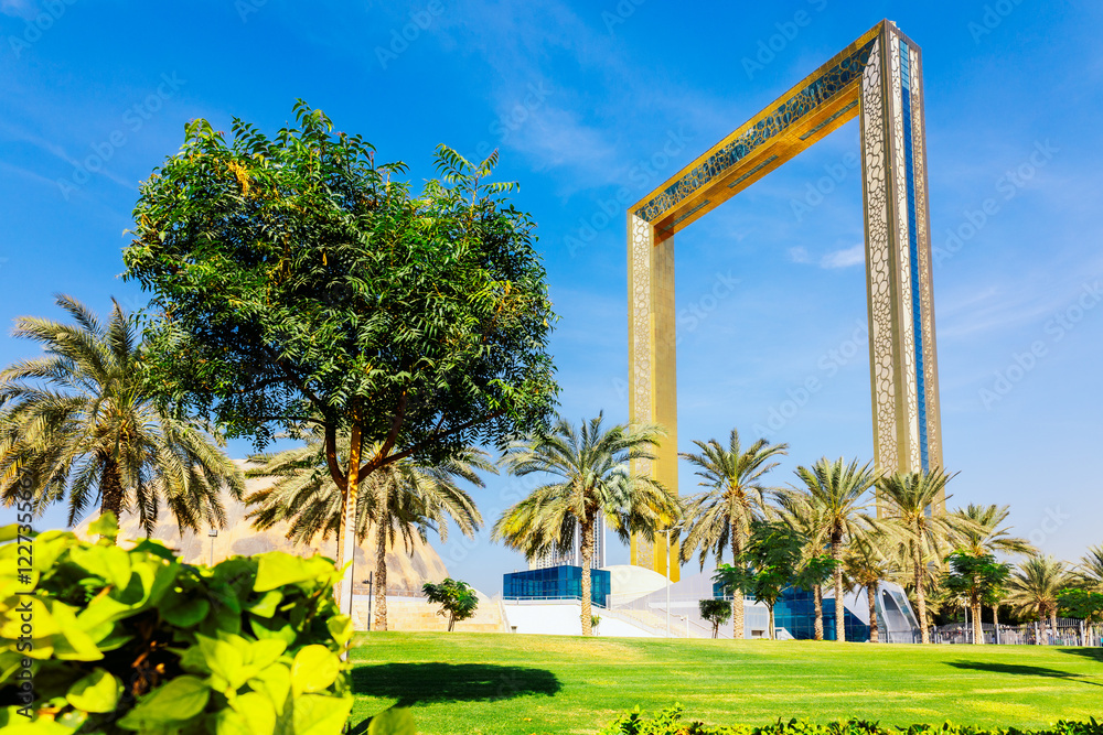 Dubai Picture Frame. Largest gold frame for photos. People walking past ...