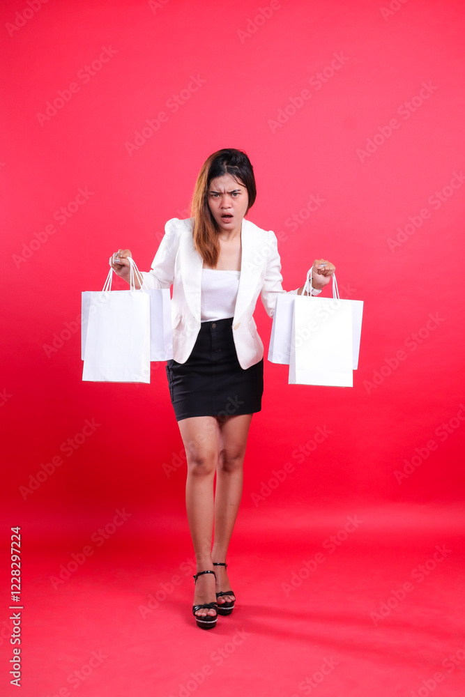 full body young woman wearing white suit angry open mouth both hands ...