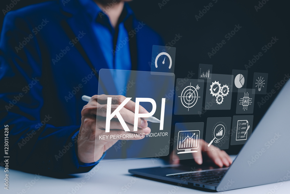 KPI, Analyzing Key Performance Indicators. Businessman use laptop to ...