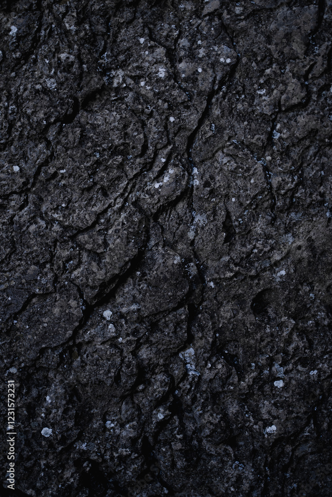 Abstract dark grey stone texture. Close up of limestone rock wall ...