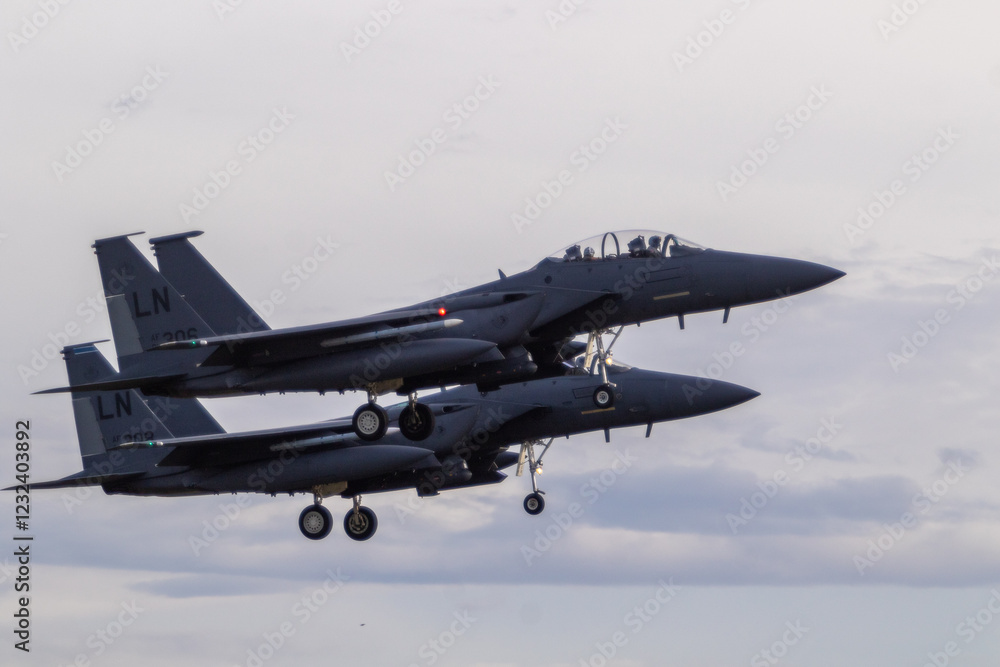 Two F15 fighter jets with landing gear down coming in to land at RAF ...
