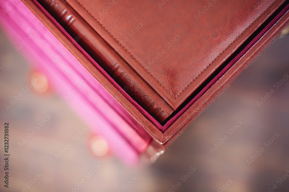 detail of photobook in brown leather binding. Wedding photo book, album ...