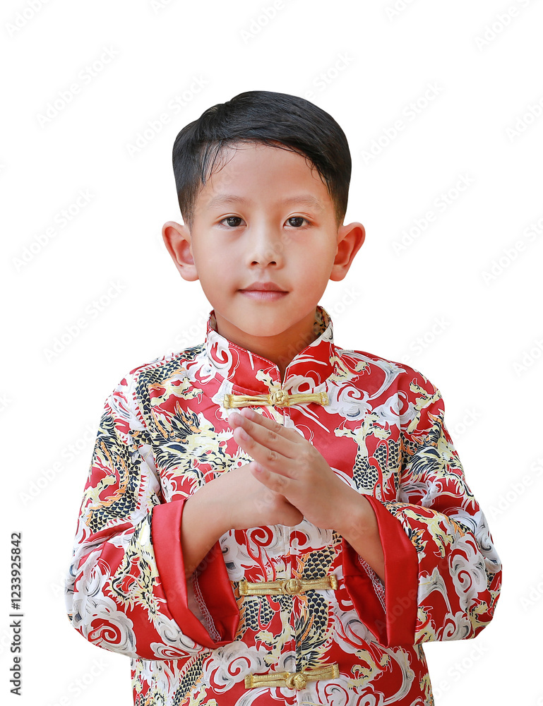 Asian Chinese boy age 7 years old in traditional dress with greeting ...