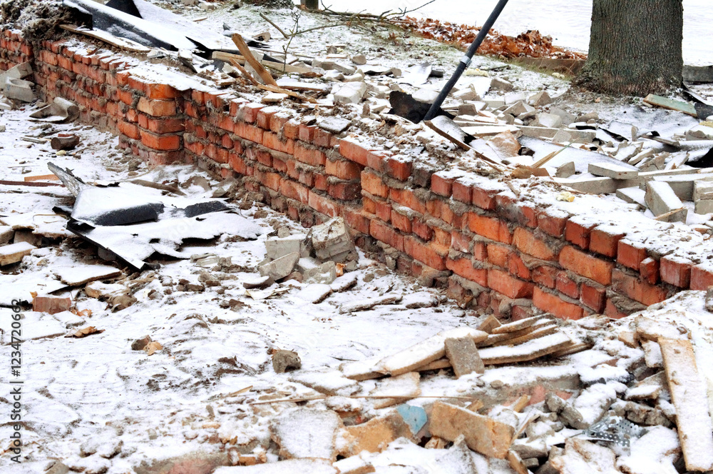 the remains of the foundation and walls of a destroyed brick building ...