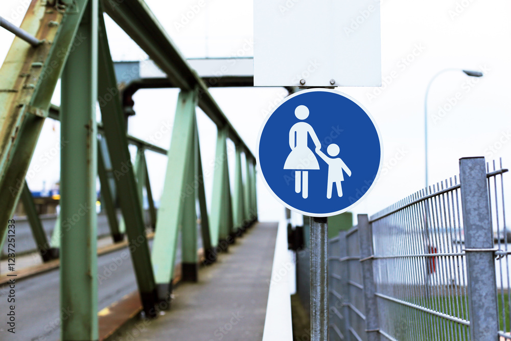 Pedestrian pathway road sign with mother and child icon. Blue circular ...