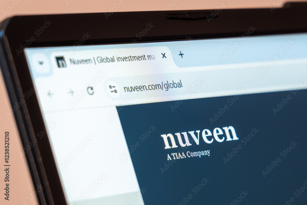 New York, USA - January 31, 2025: Nuveen website homepage on laptop screen showcasing global ...