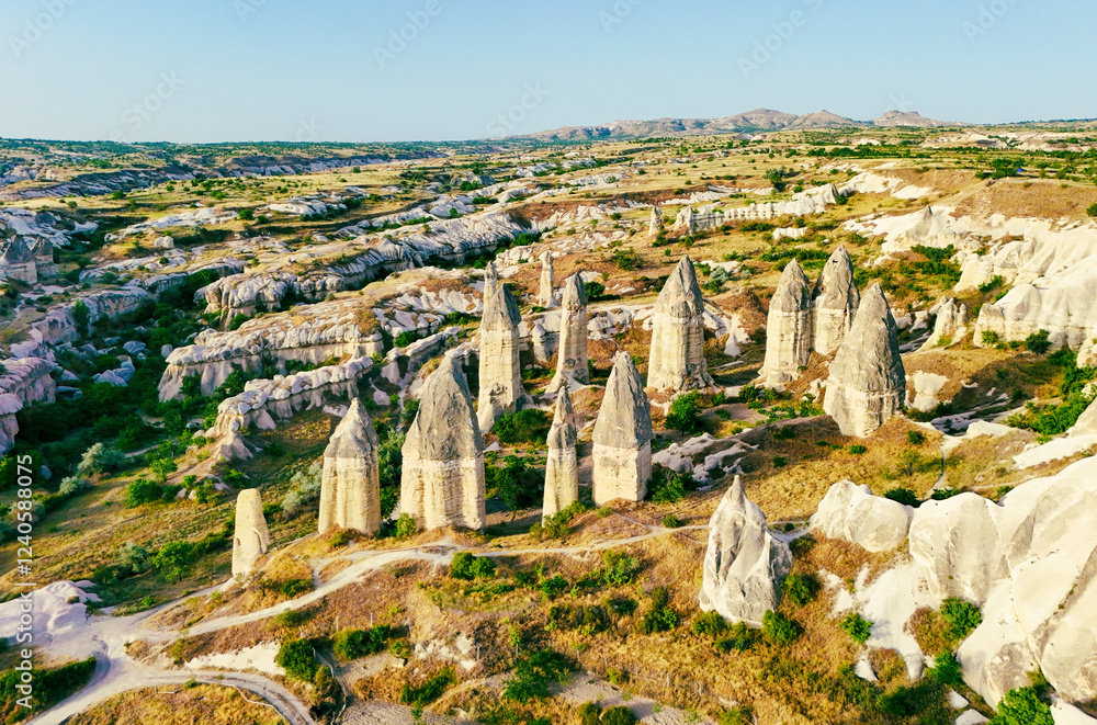 Aerial view of fairy chimneys and unique rock formations in a scenic ...