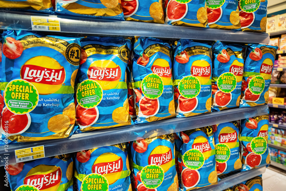 16 January 2025, Abu Dhabi, UAE: Many bags of Lays chips with ketchup ...