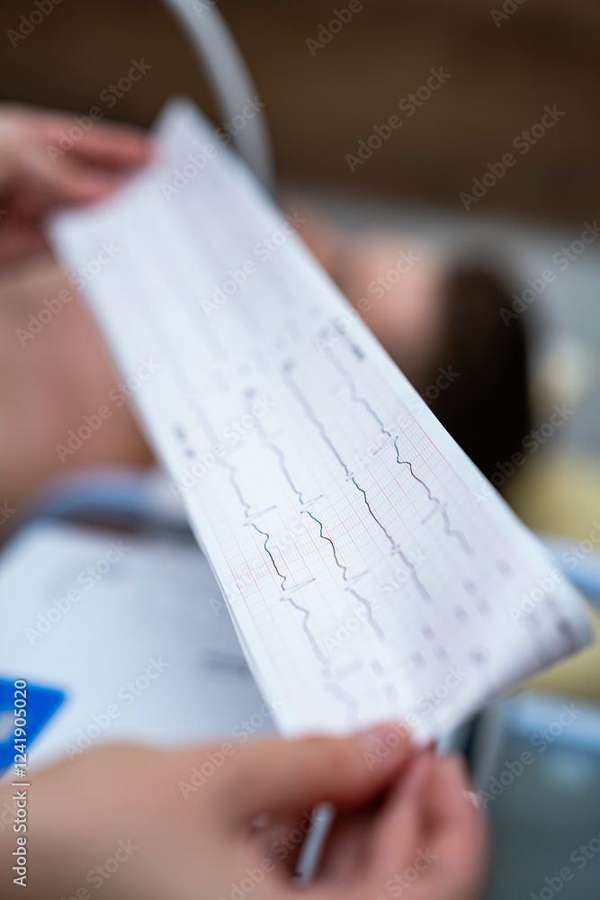 Tracking vital signs in medicine. A healthcare professional monitors a ...