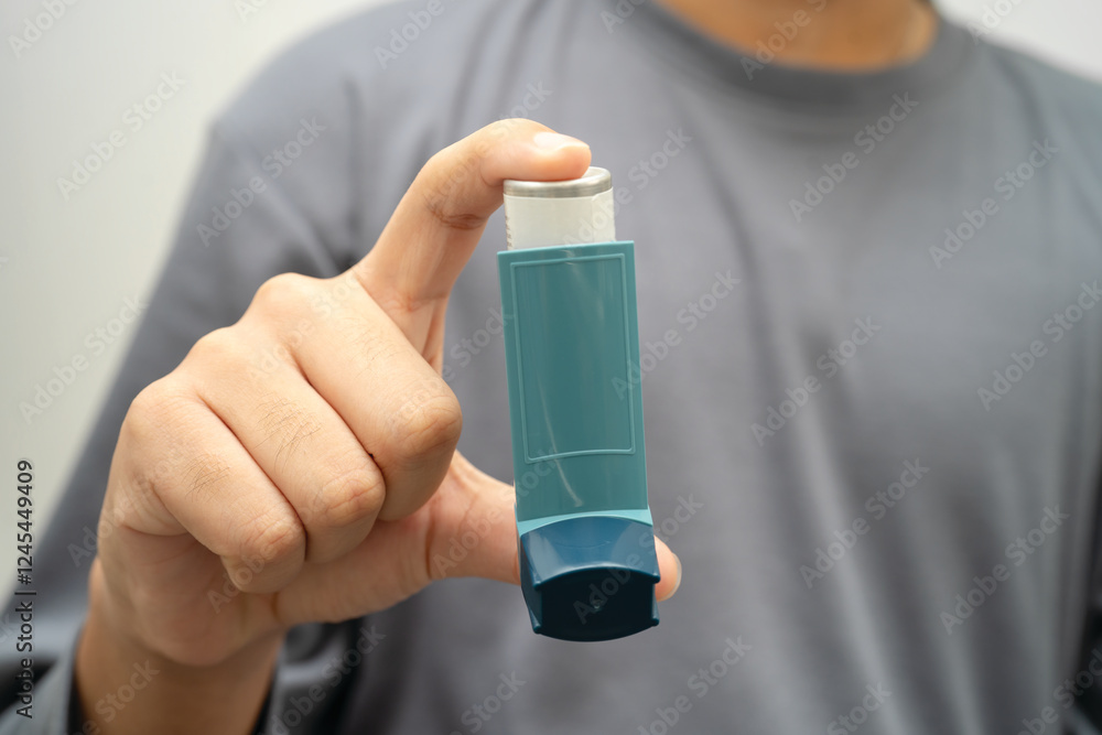 Asthma and chronic obstructive pulmonary disease COPD, Asian young man ...