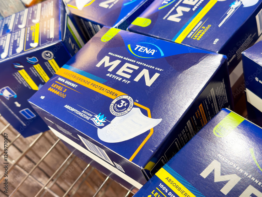Tena men incontinence protector packages on display in store shelf Stock Photo | Adobe Stock