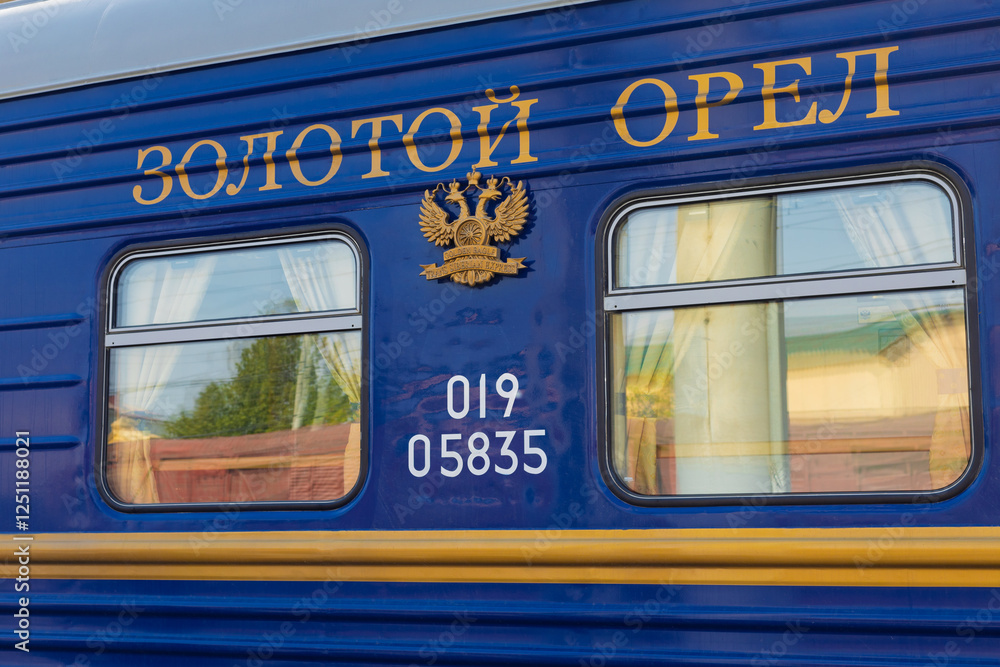 Samarkand, Uzbekistan - 3 October 2024: close-up logo of Golden Eagle ...
